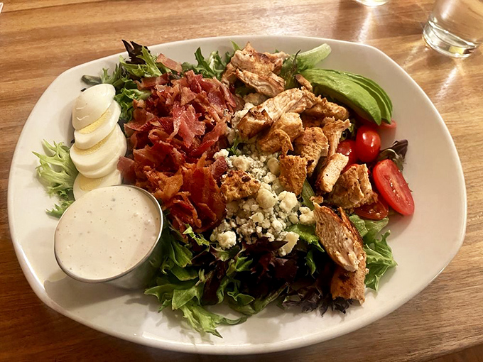 A Cobb salad that's dressed to impress, with each ingredient playing its part in perfect harmony.