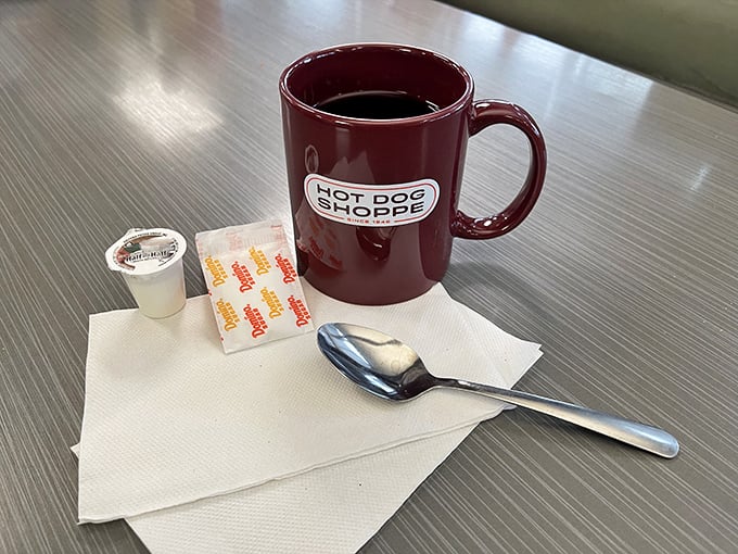 That burgundy mug isn't just holding coffee&mdash;it's cradling liquid ambition for your day ahead. The perfect companion to any Jib Jab feast.