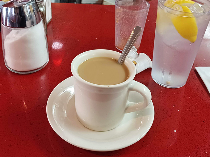 The humble coffee mug – unassuming vessel of liquid motivation. In diners, the first cup is just the beginning of a beautiful relationship.