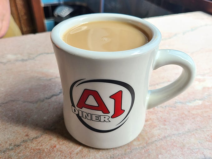 The diner mug &ndash; sturdy, unpretentious, and filled with coffee that says, "Good morning" like it actually means it.