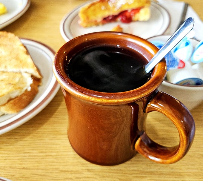 Coffee served in a mug substantial enough to hug back&mdash;the kind that says "Good morning" in a voice you actually want to hear.