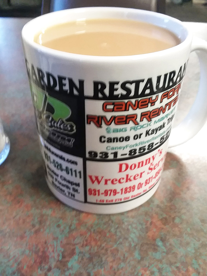 The coffee mug doubles as local advertising space &ndash; a charming reminder you're dining where community connections matter as much as caffeine.
