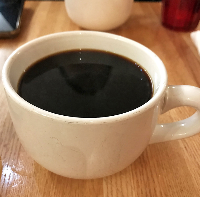 Simple pleasures: a sturdy mug of coffee strong enough to jumpstart your mountain adventures or just your conversation.