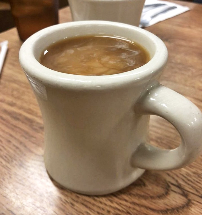 The humble diner mug &ndash; holding liquid motivation since forever. No fancy latte art needed when the coffee itself is this honest and dependable.
