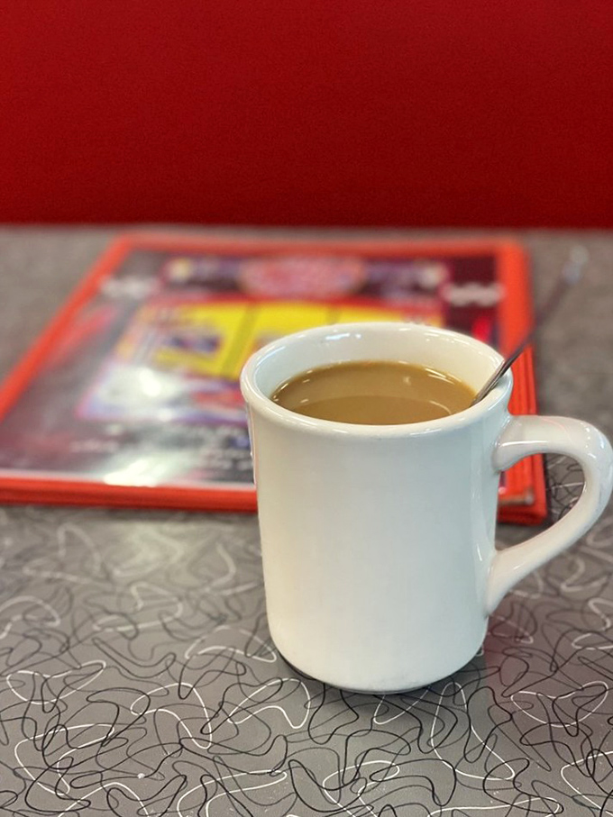 The humble diner coffee mug&mdash;holding the elixir that transforms zombies into humans since forever. Simple, reliable, essential.