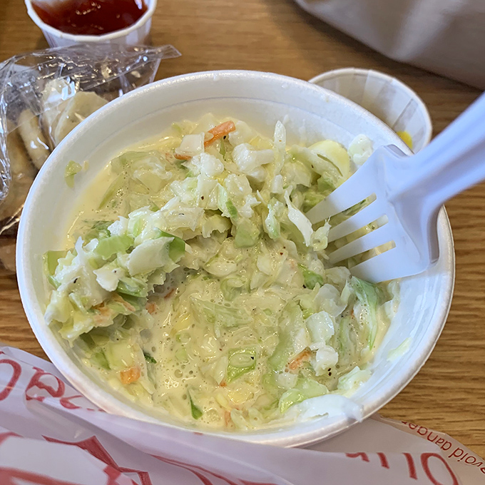 The coleslaw at Coleman's - creamy, crunchy, and just tangy enough to cut through the richness of fried seafood. The perfect sidekick to that famous sandwich.
