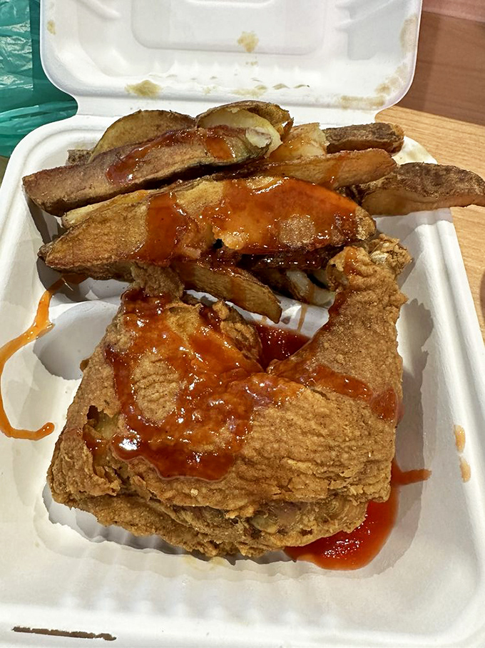 Chicken and fries with a side of sauce that's saying, "Go ahead, make my day." Comfort food that speaks your language.