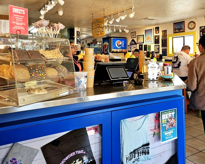 The counter area doubles as a museum of satisfied customers, where desserts tempt you before you've finished your main course&mdash;a delicious dilemma.