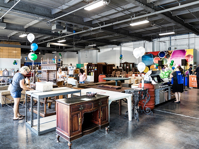 Shoppers navigate the aisles with the focused determination of archaeologists, each hoping to unearth that perfect household artifact.