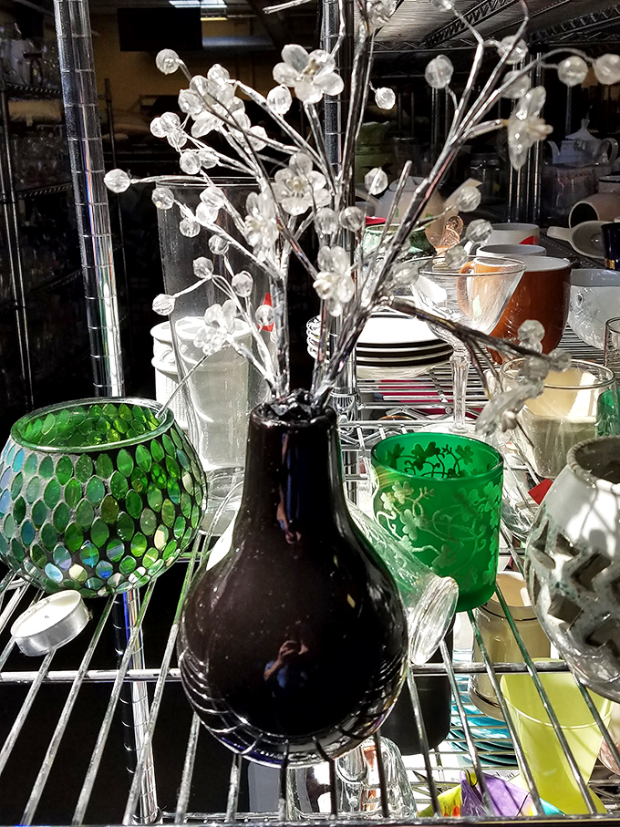 Crystal stemware and vintage vases sparkle under the lights, ready to make your dinner parties look ridiculously fancy.