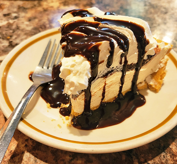 Pie that doesn't need Instagram filters&mdash;just chocolate sauce cascading down creamy layers that make diets seem like terrible life choices.