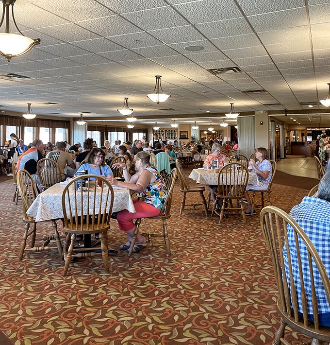 The dining room hums with the universal language of satisfaction &ndash; forks meeting plates, ice clinking in glasses, and the occasional "you've got to try this."