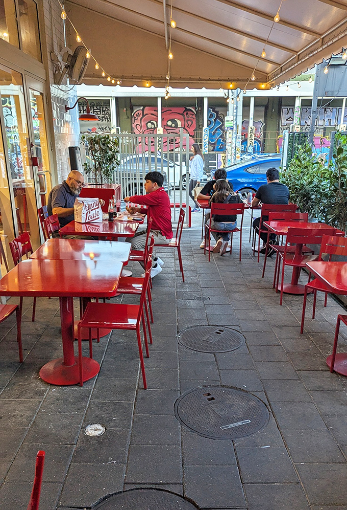 The outdoor seating area&mdash;where Miami's vibrant street life provides the entertainment while you focus on burger bliss.