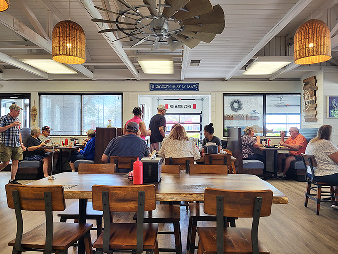 Where locals gather to break bread and swap fish tales. That "No Wake Zone" sign isn't just decoration&mdash;it's dining philosophy at its finest.