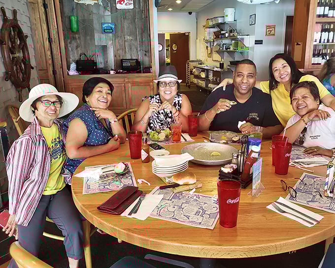Nothing says "we found the good stuff" like a table of happy diners creating memories that will last longer than their seafood cravings.