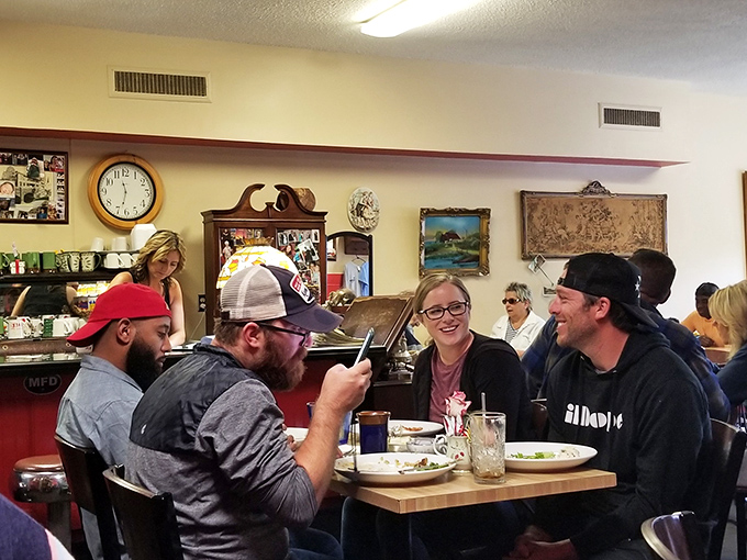 Friends gathered around plates, proving that breakfast is indeed the most social meal of the day.