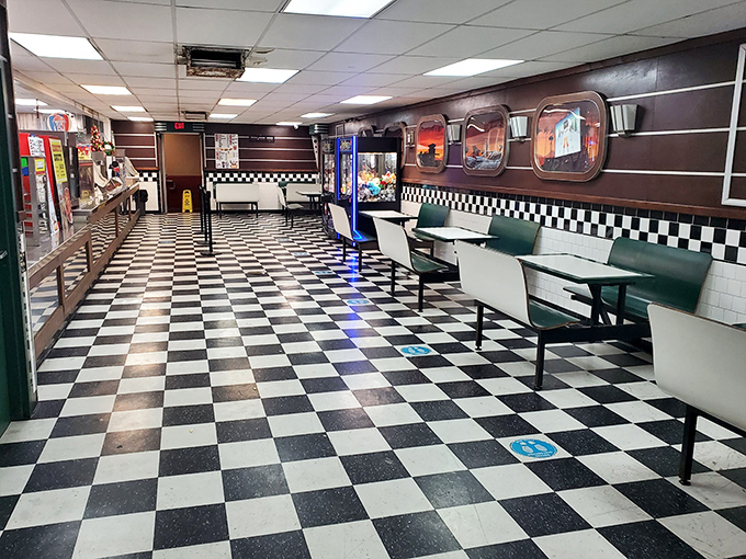 Black and white checkerboard floors transport you to simpler times&mdash;this isn't just dining, it's a portal to 1950s Americana.