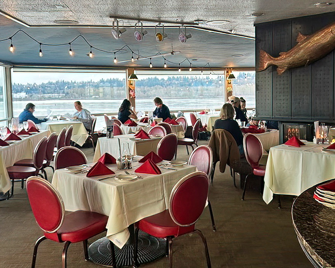 Red chairs pop against white tablecloths while the Columbia River provides nature's best dinner theater through those magnificent windows. Talk about dinner with a view!