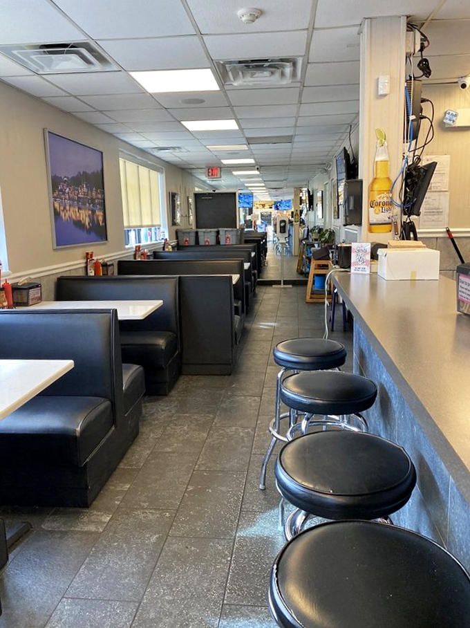 Booth seating where countless locals have experienced their cheesesteak awakening&mdash;the atmosphere is deliciously unpretentious and welcoming.