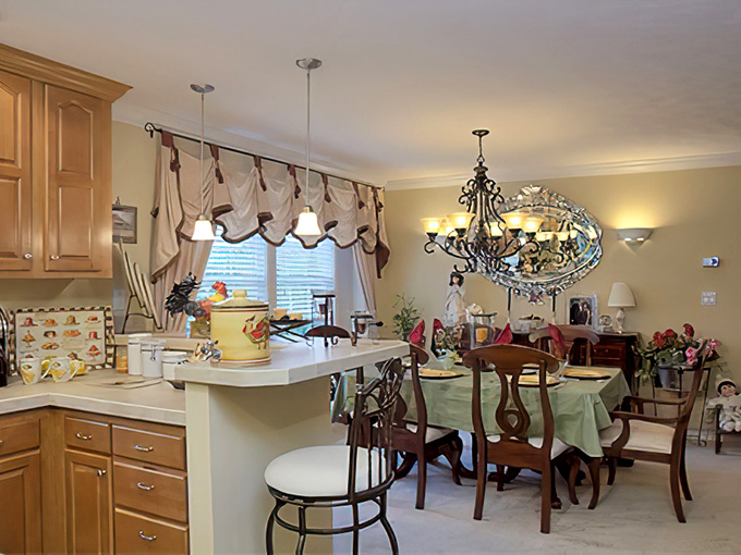 Dining areas that seamlessly connect to kitchens&mdash;because the best conversations happen when food preparation and enjoyment share the same space.