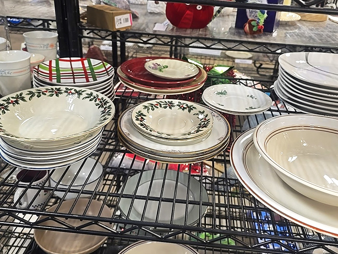 Holiday plates and everyday dinnerware mingle on metal shelves, ready to host everything from Tuesday tacos to Thanksgiving feasts.