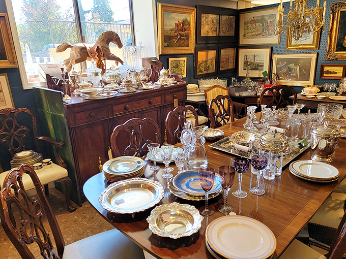 A dining table that's seen more elegant conversations than Downton Abbey, surrounded by silver and crystal waiting for their next soir&eacute;e.