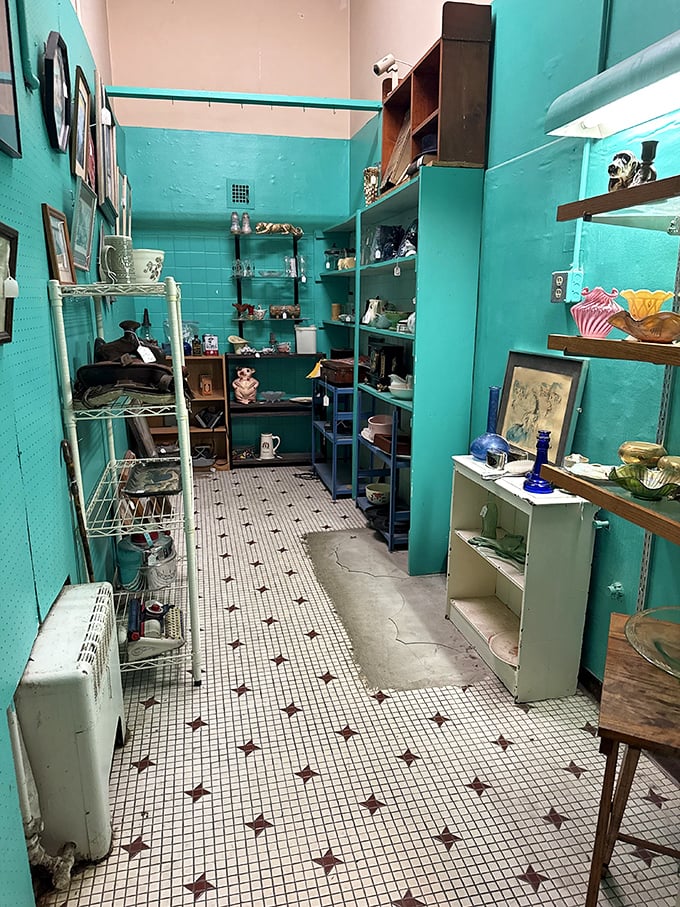 Turquoise walls frame this time capsule of a room, where the star-patterned tile floor has witnessed decades of Columbus shoppers hunting for vintage treasures. 