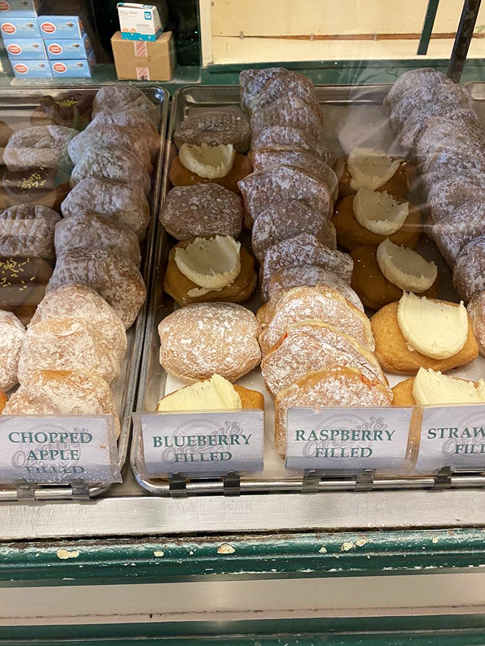 The display case at Oram's&mdash;where diet plans go to die and happiness is served by the dozen.