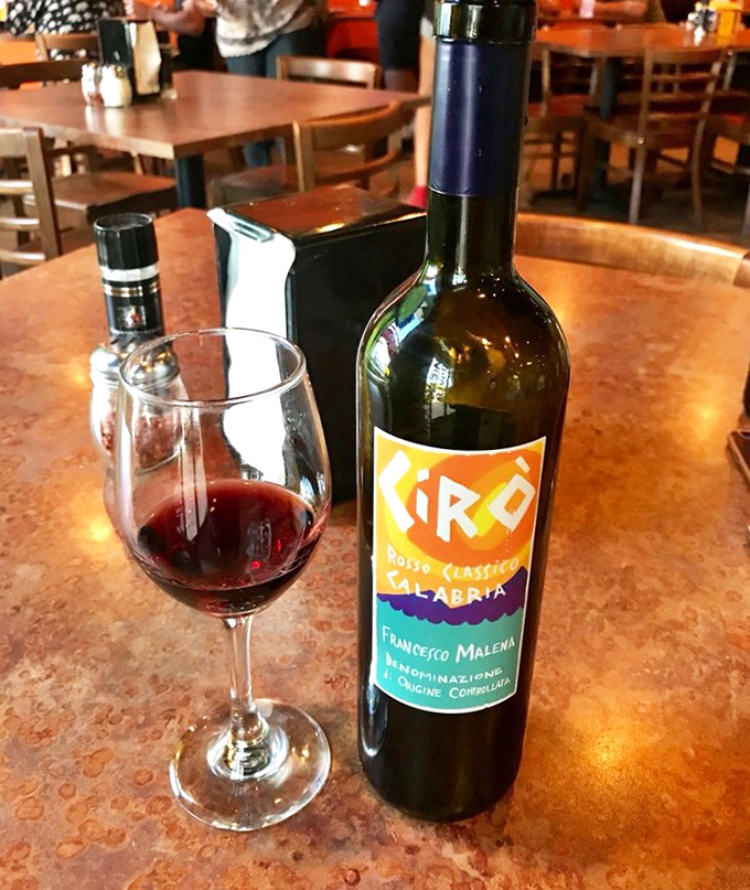 Wine at a pizza joint? Absolutely. This Italian red doesn't just complement the food—it elevates the entire experience from meal to occasion.