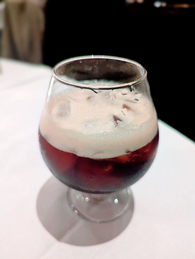 This isn't just a dessert; it's a boozy, creamy celebration in a glass. The kind of finale that makes you linger at the table long after the check arrives.