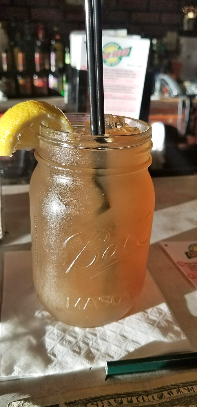 Nothing says "vacation mode activated" like a cold drink in a Mason jar with a lemon wedge after a day at Lake Huron.