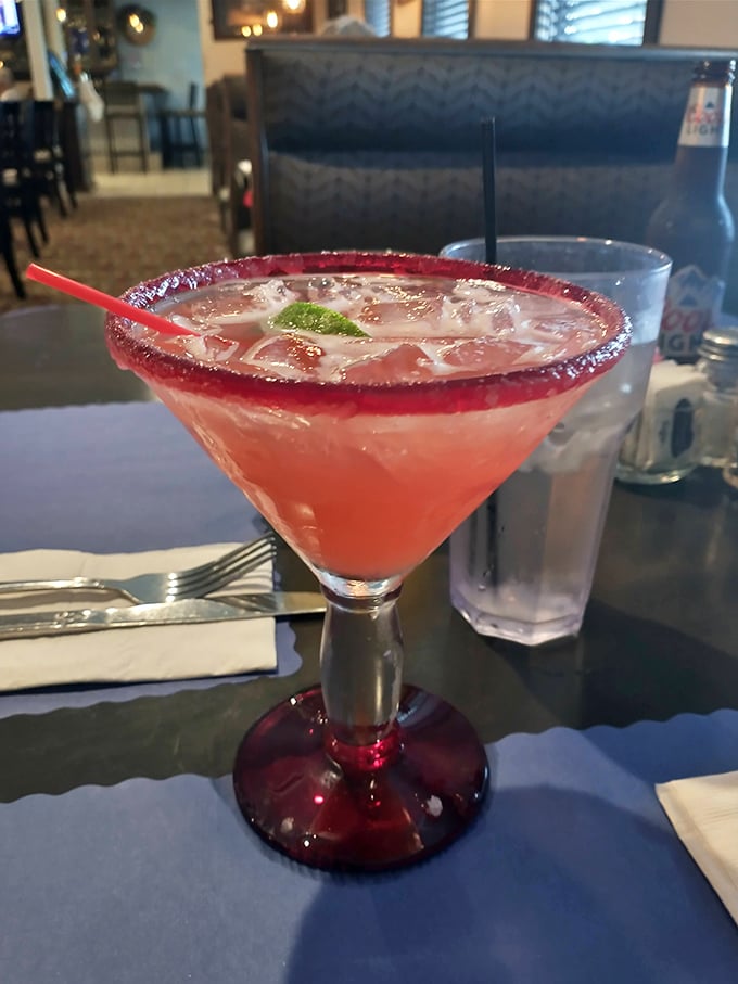 A cocktail that's dressed better than most people at the party—vibrant, refreshing, and rimmed with promise.