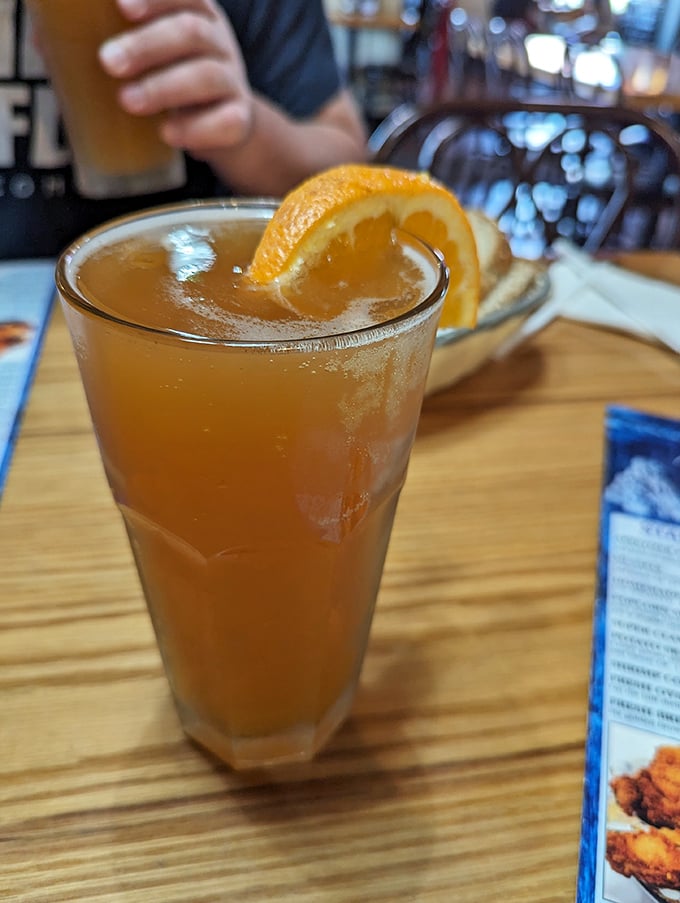 That's not just any drink &ndash; it's liquid sunshine garnished with orange, the perfect companion for washing down walleye and washing away workday worries.