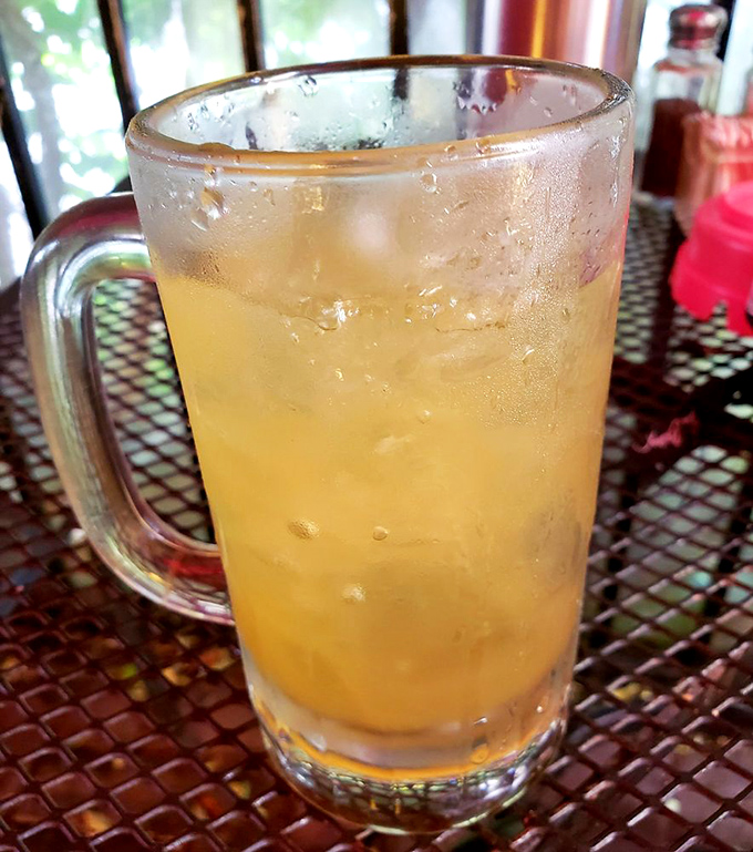 Nothing says summer in Kentucky quite like a frosty glass of sweet tea, condensation racing down the sides like it's running the Derby.