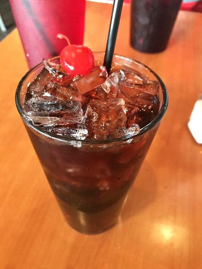 That cherry-topped drink isn't just a beverage&mdash;it's a commitment to treating yourself right. Tuesday suddenly feels like Friday night.