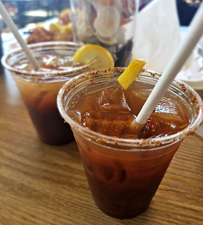 Their specialty drinks come with rims dusted in what appears to be seafood seasoning. Even the beverages here have gone to finishing school.