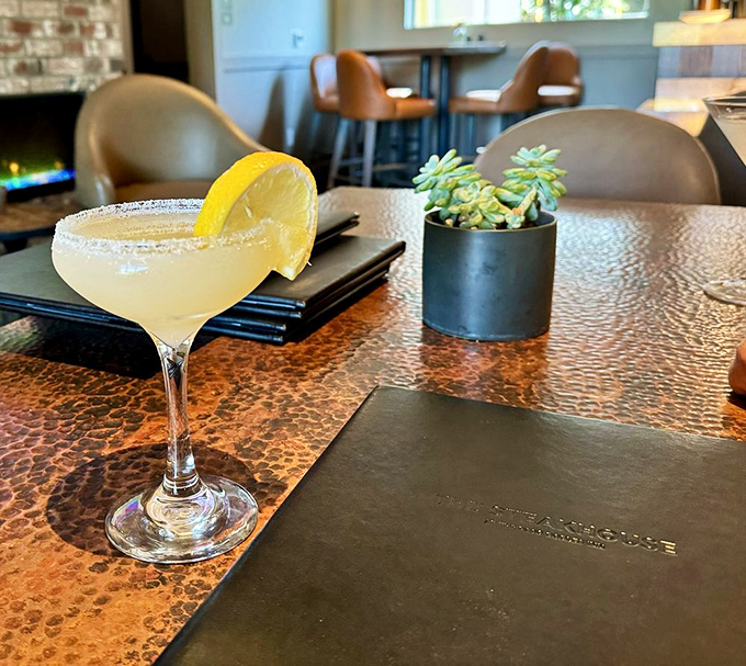 A classic margarita with salt rim awaits on the copper-topped table &ndash; the perfect prelude to a serious steak session.