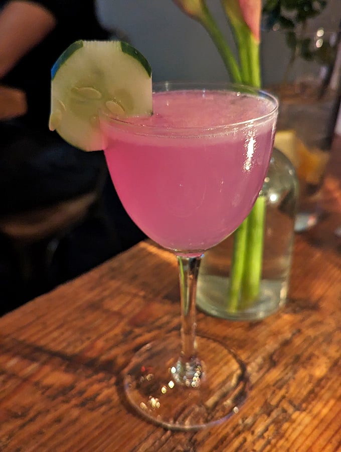 Their cocktails come dressed better than most people at weddings&mdash;this vibrant pink number with cucumber garnish is basically liquid joy.