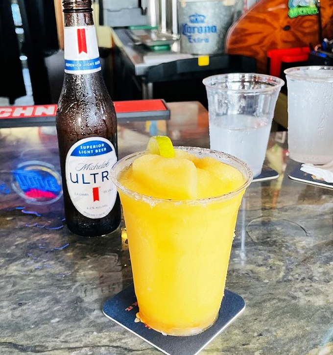 When your frozen drink matches the Florida sunset, it's not just refreshment&mdash;it's destiny in a plastic cup.