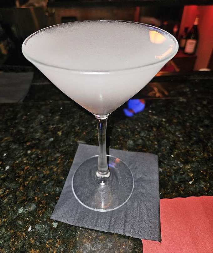 A perfectly frosted martini glass waiting to complement your meal. James Bond would approve of this elegant palate cleanser.