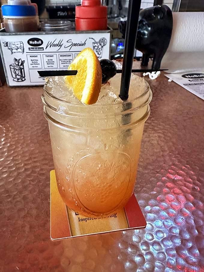 A cocktail that's dressed better than most people at the party, with garnishes that aren't just for show but flavor conspirators.