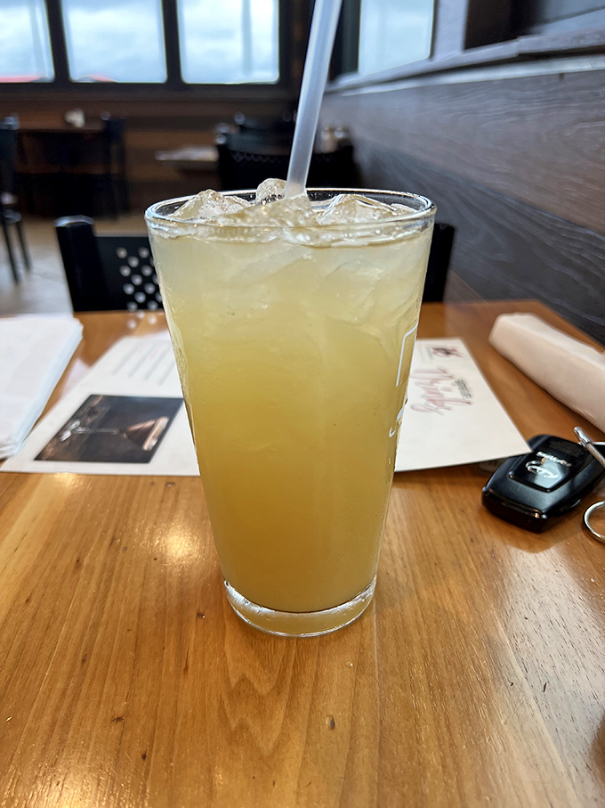 A tall glass of sunshine that makes you wonder if they bottled actual good vibes. Perfect for washing down everything or nothing at all.