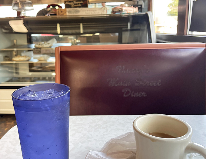 The blue glass of ice water and steaming coffee: diner yin and yang, the perfect companions to whatever comfort food you're about to devour.