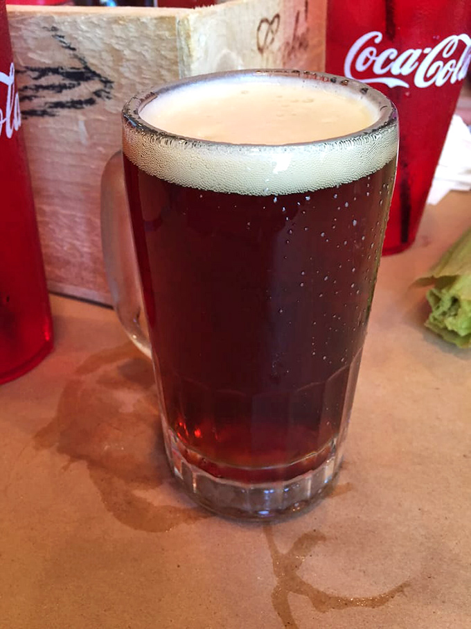 A perfectly poured dark beer&mdash;because cracking crabs is thirsty work that deserves a proper reward.