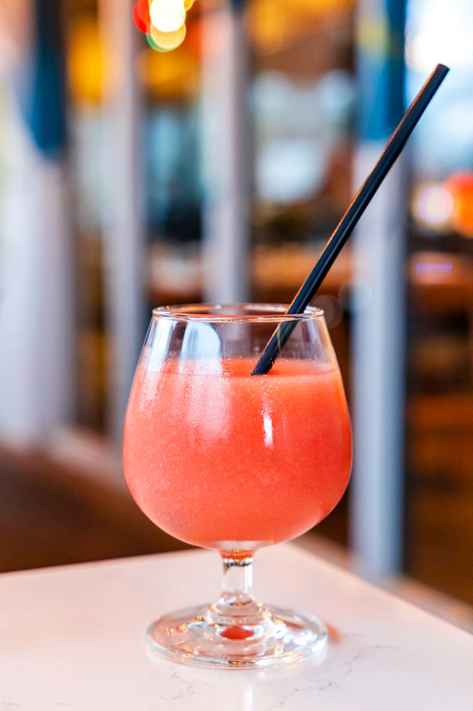 A sunset in a glass&mdash;this coral-hued cocktail promises refreshment with a side of sophistication, no beach vacation required.