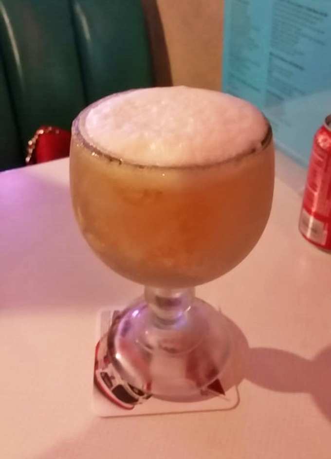 This frosty goblet isn't just a drink, it's a vacation in glassware form &ndash; the perfect companion to tame the Cajun spice parade.