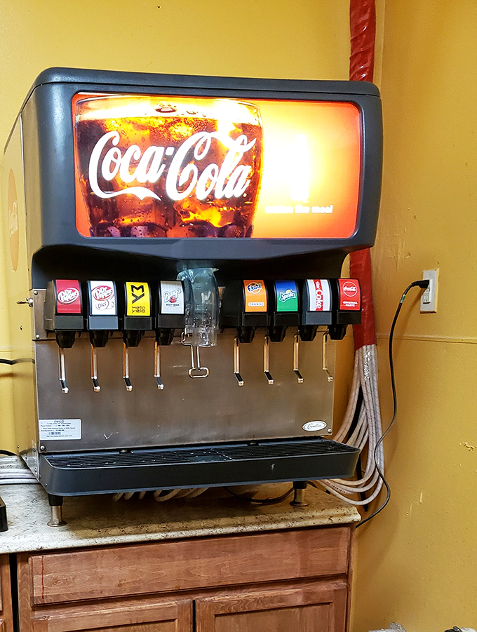 The soda fountain&mdash;where decisions about Coke versus Dr Pepper feel momentarily significant against the yellow wall that radiates warmth like Tennessee sunshine.