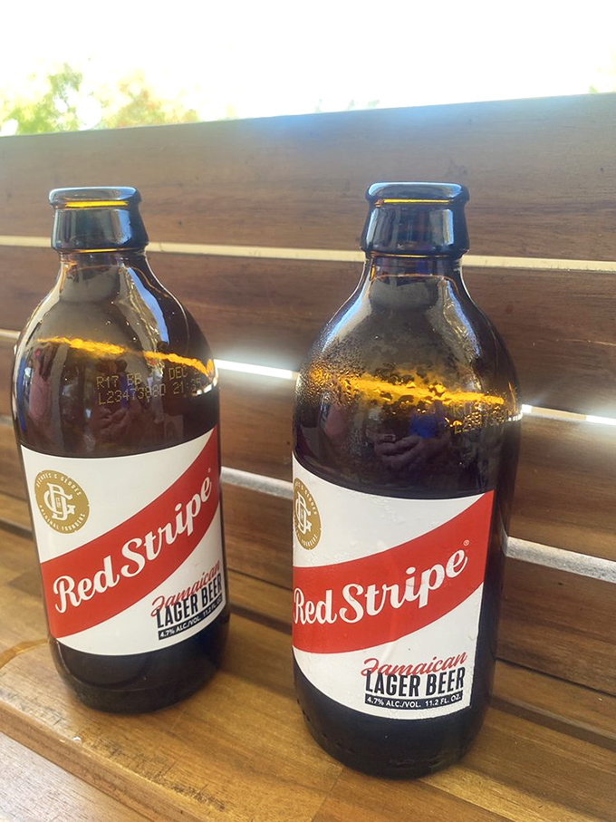 Nothing complements fresh seafood quite like cold Red Stripes&mdash;these bottles are sweating almost as much as I am in Florida's humidity.