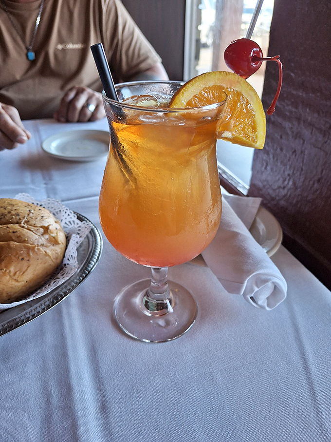 A cocktail this photogenic deserves its own Instagram account. That cherry and orange slice aren't garnishes&mdash;they're the jewelry this drink deserves.
