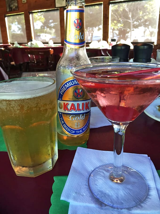 When your drinks match the view. Nothing says "vacation mode activated" like a cold beer and a colorful cocktail by the water.